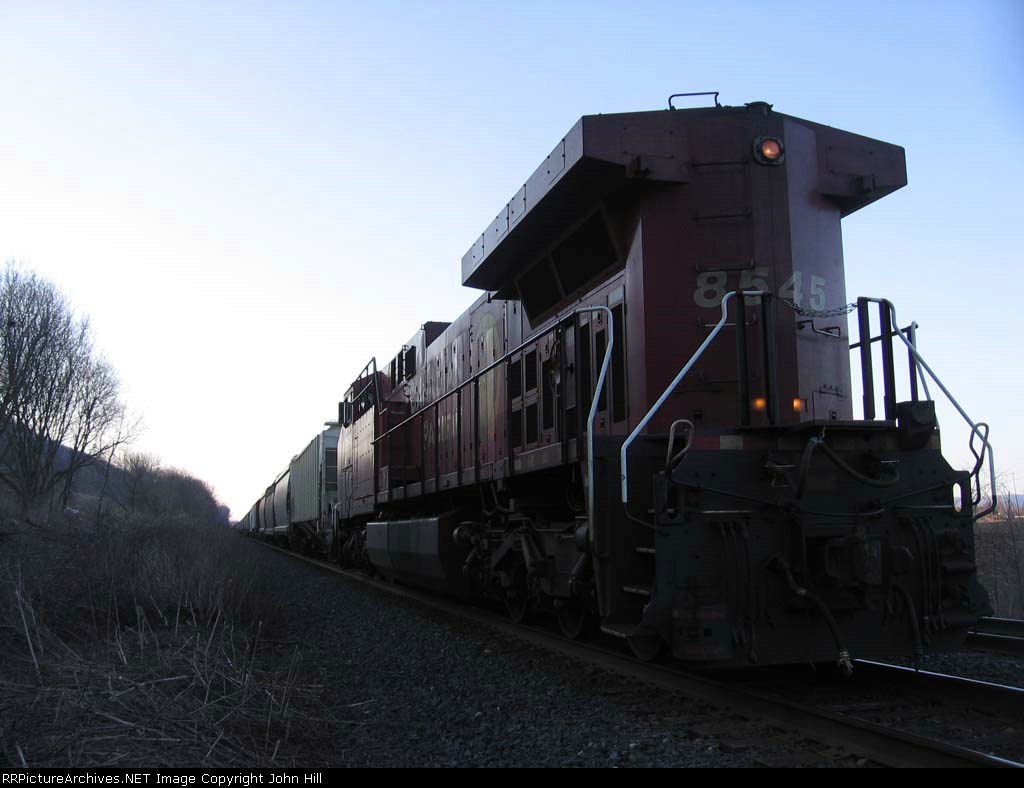 07031729 Westbound CP freight waits at East Midland with power run-around to rear of train